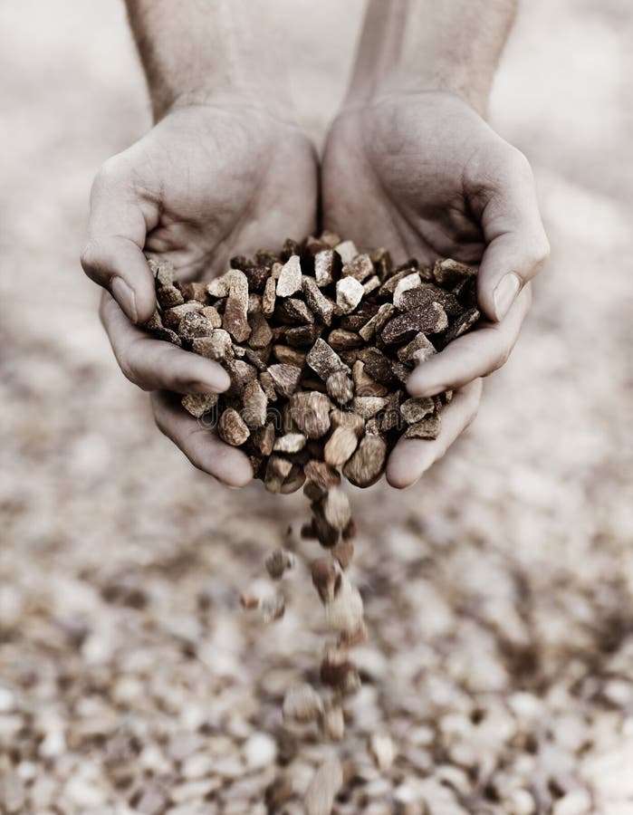 Letting the Stones Fall. Closeup of Two Hands Holding Gravel. Stock ...
