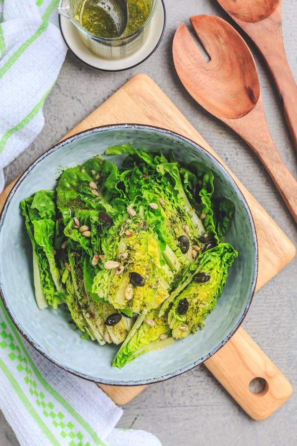 Lettuce Salad with Olive Oil Dressing in Bowl Stock Image - Image of ...