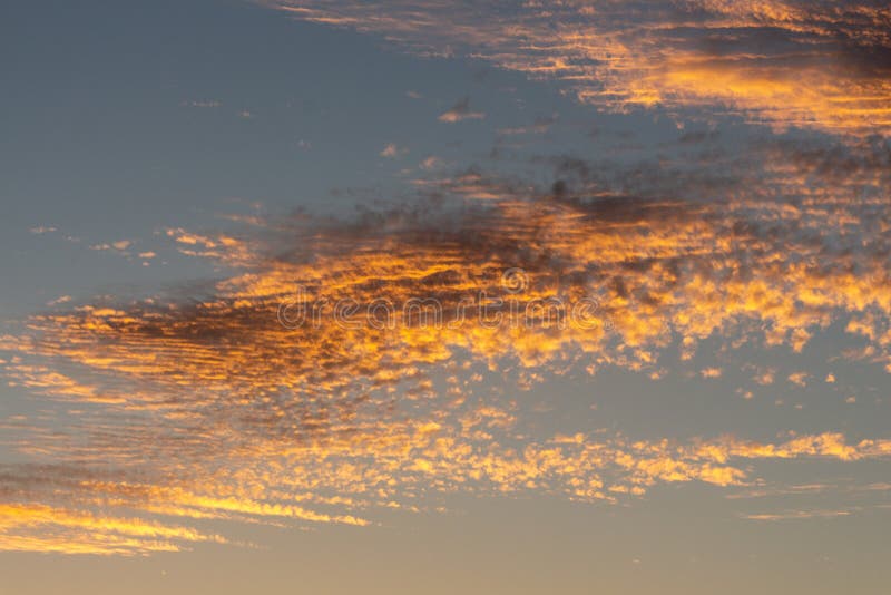 Luminous Clouds in the Evening Sky Stock Image - Image of gold, orange ...