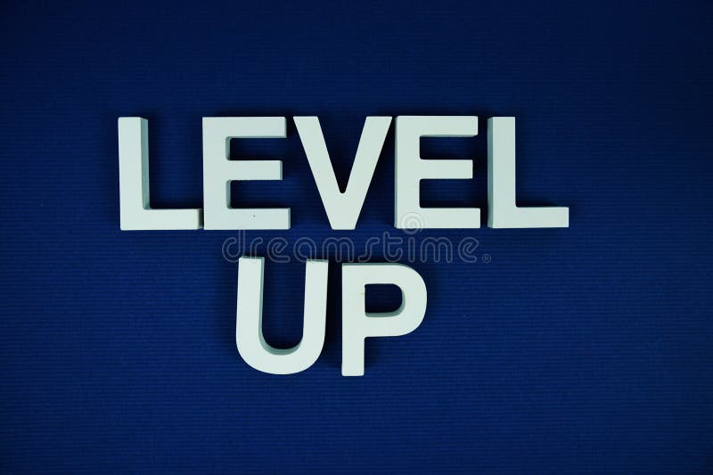Level Up Alphabet Letters on Navy Blue Background Stock Photo - Image ...