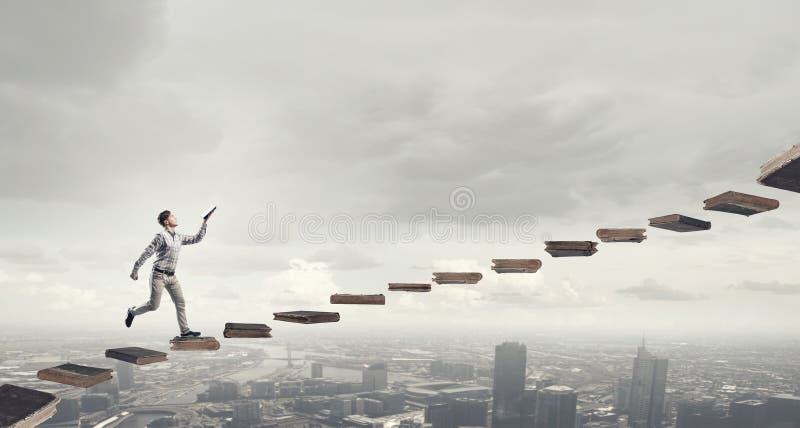 Level your knowledge stock photo. Image of literature - 62303766