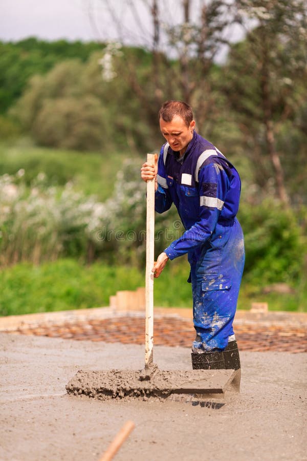 Leveling of the Cement or Concrete of the Foundation Formwork from ...