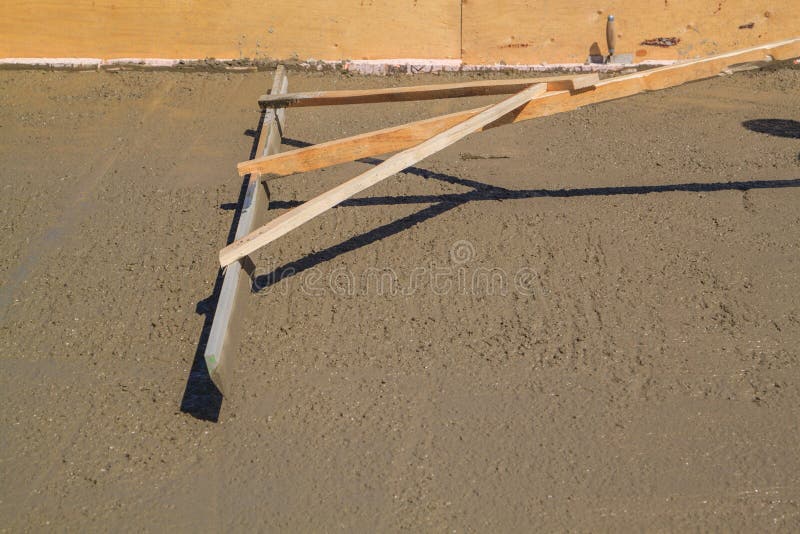 Leveling Concrete Slab with Special Working Tool Stock Photo - Image of ...