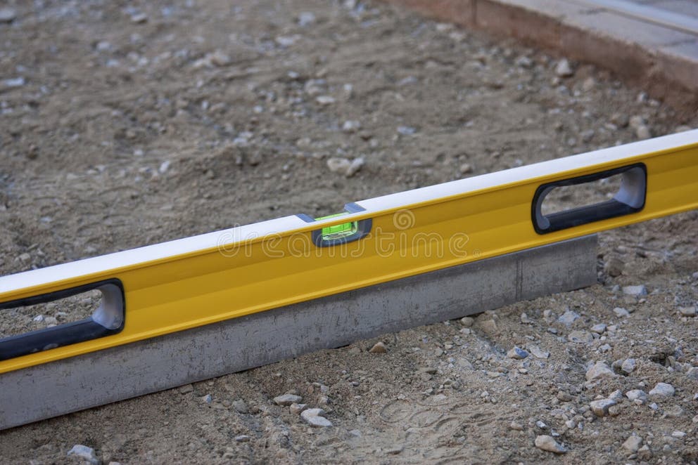 Leveling the Ground with a Spirit Level Stock Photo - Image of activity ...