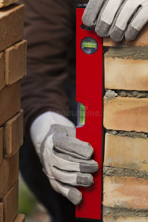 Leveling the Masonry Bricks Stock Photo - Image of manual, renovation ...