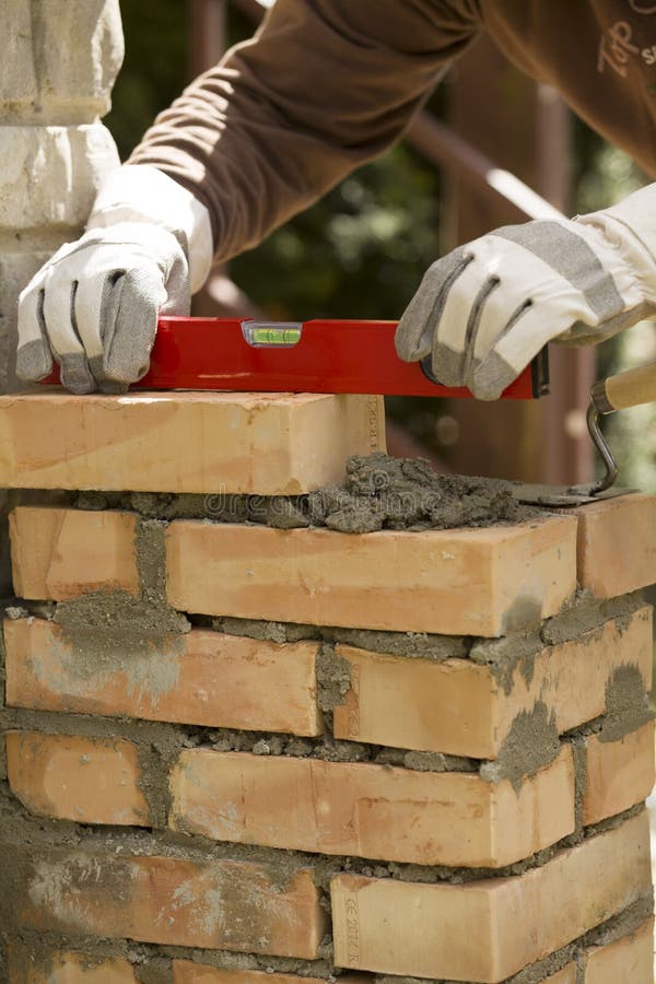Bricklayers Leveling Bricks Stock Photos - Free & Royalty-Free Stock ...