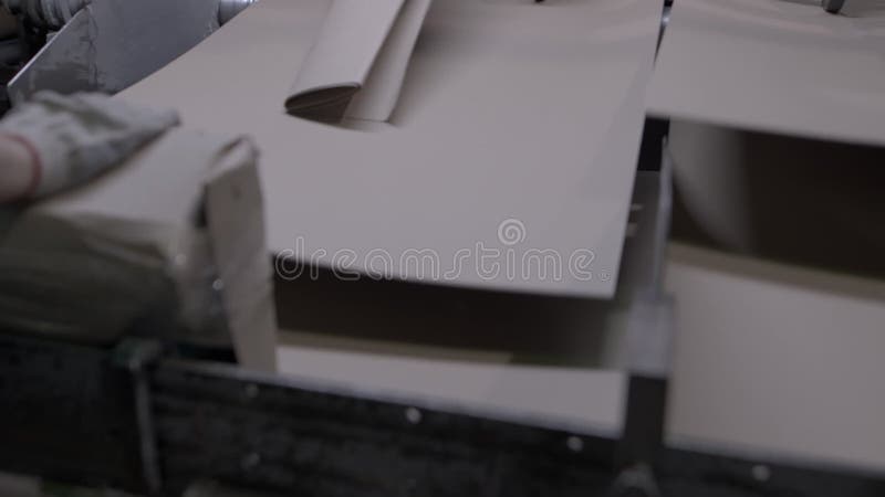 Leveling Surface of Cardboard Sheets on Machine in Plant Stock Footage ...