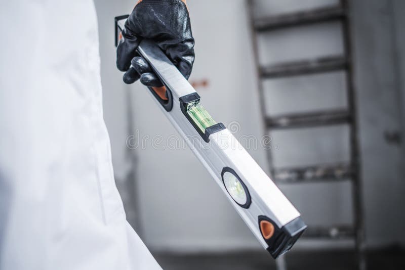 Leveling Tool in a Hand stock photo. Image of tool, industry - 91028390