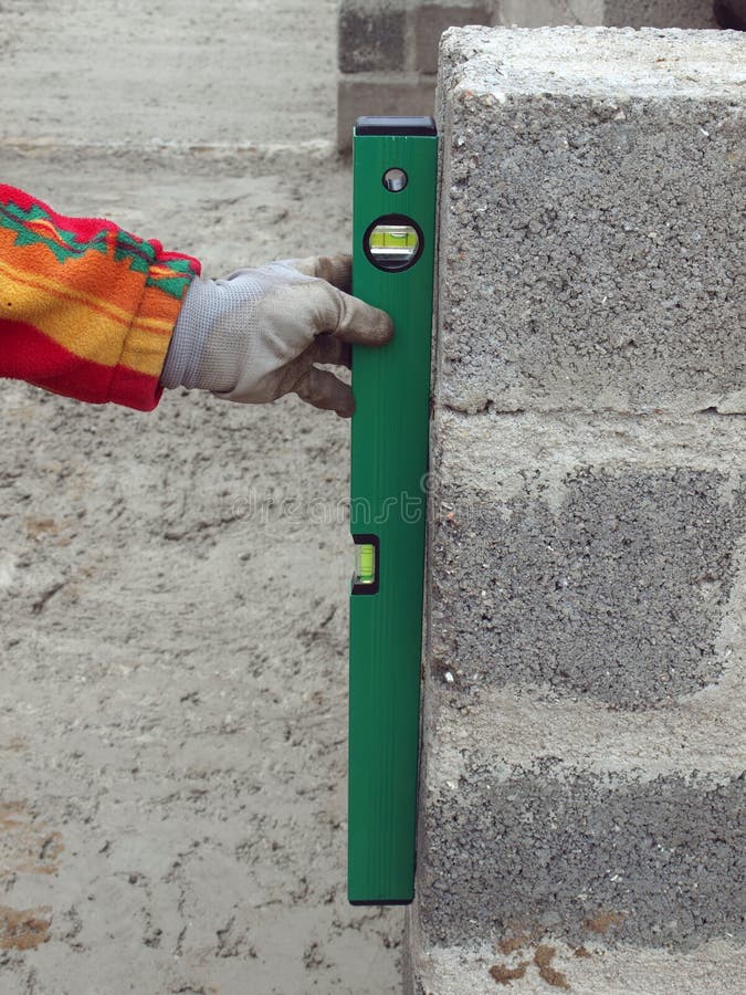 Leveling wall vertical stock photo. Image of close, wall - 34136866