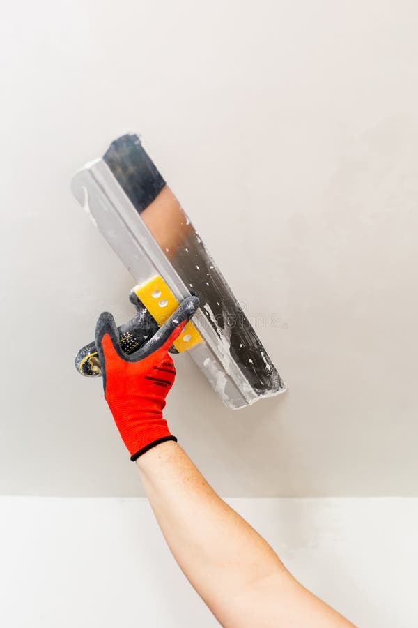 Leveling the Walls with White Putty Stock Image - Image of plaster ...