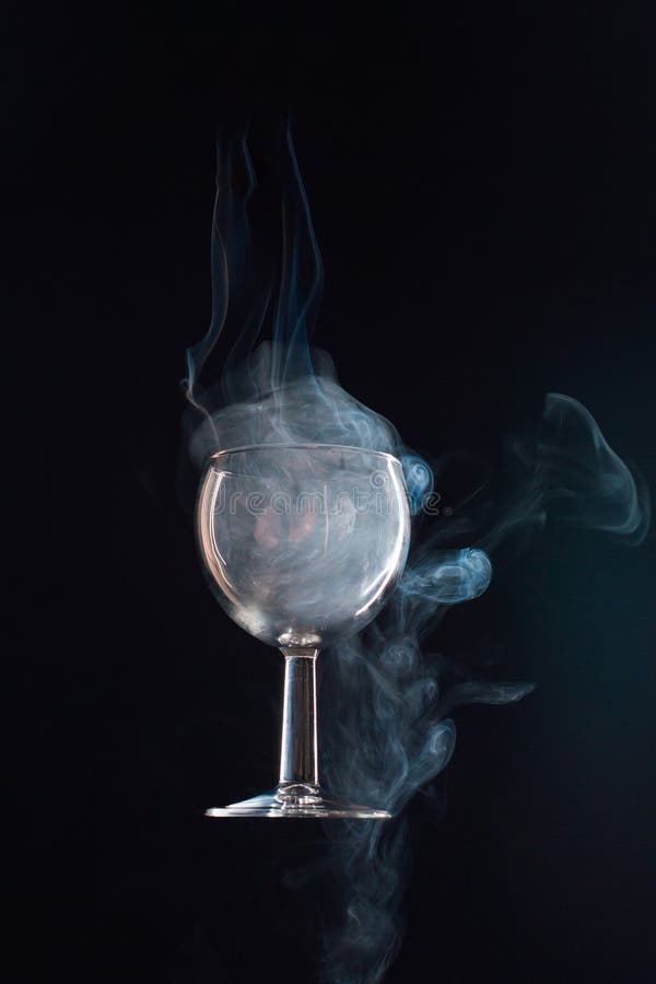 Levitating Glass Full of Smoke on a Black Background Stock Image ...