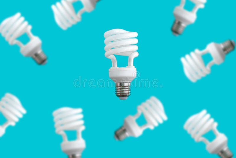 Levitating Energy Saving Light Bulbs on Blue Background, Energy Saving ...