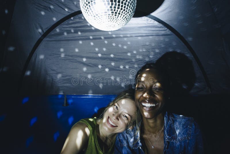 LGBT Couple Facial Expression with Disco Ball at Night Stock Photo ...