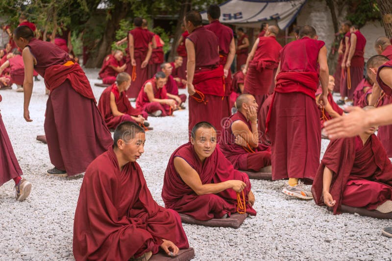 Young Monks Practicing the Art of Debate in a Sunny Courtyard of Sera ...