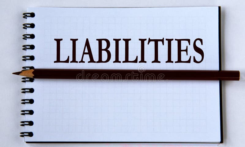 LIABILITIES - Word in White Notebook on White Background with Pencil ...
