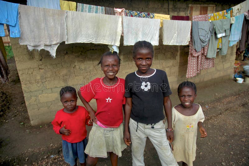 Liberian Children in Front of Hut Editorial Photo - Image of ...
