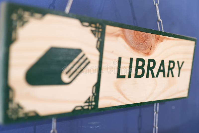 Library and Book Sign on a Wall. Stock Image - Image of sign ...
