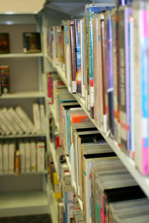 Books on a Public Library Shelves. Editorial Stock Image - Image of ...