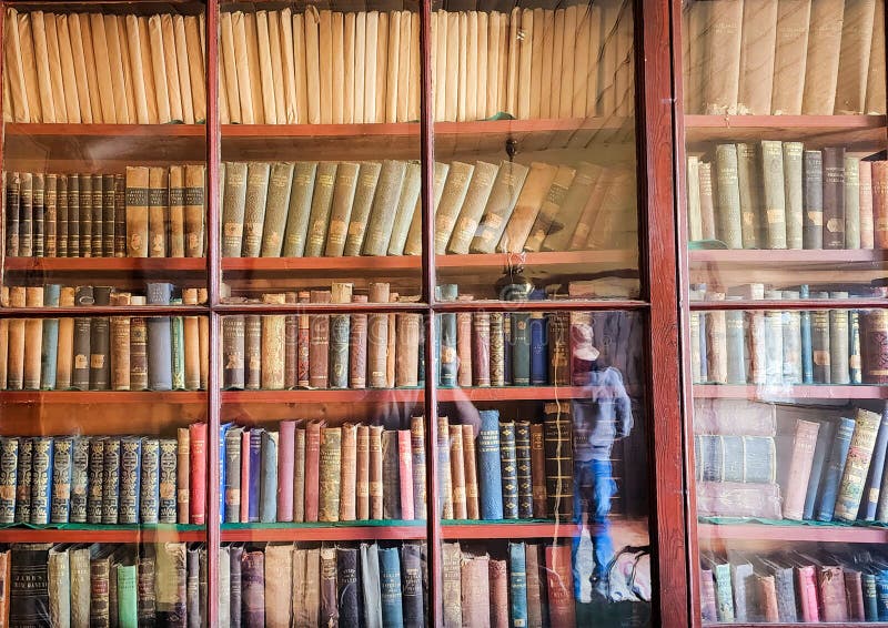 Library Books with Light Reflection Stock Photo - Image of book, shelf ...