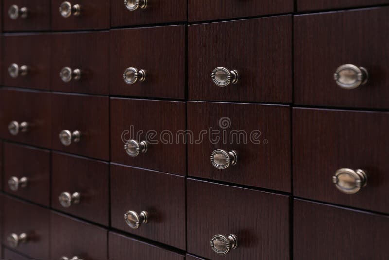 Library Catalog. Wooden Chest of Drawers, Closeup Stock Image - Image ...