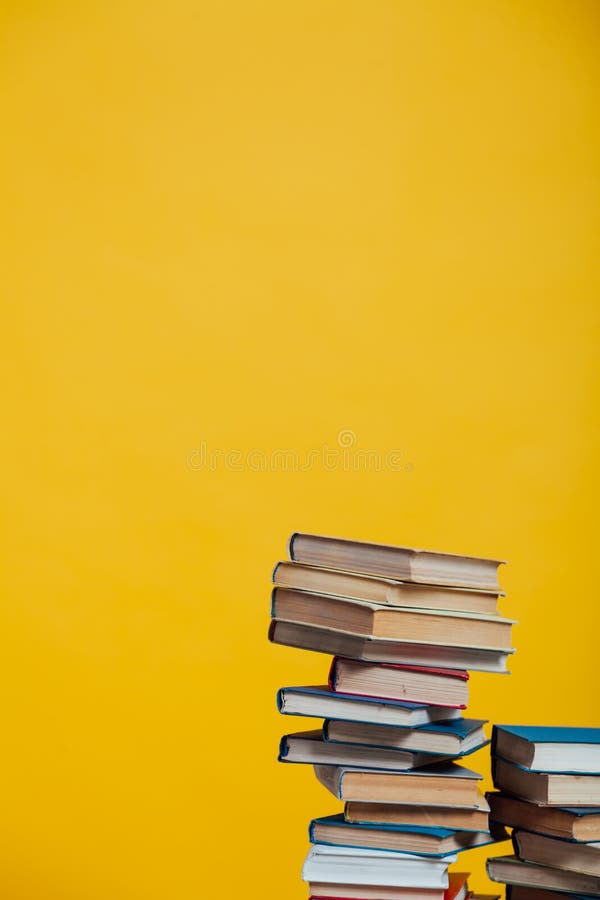 Library of Many Books for Learning on a Yellow Background Stock Photo ...