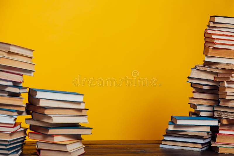 Yellow Library Book Cart With Sign, And Books Stacked On A Shelf To Be ...