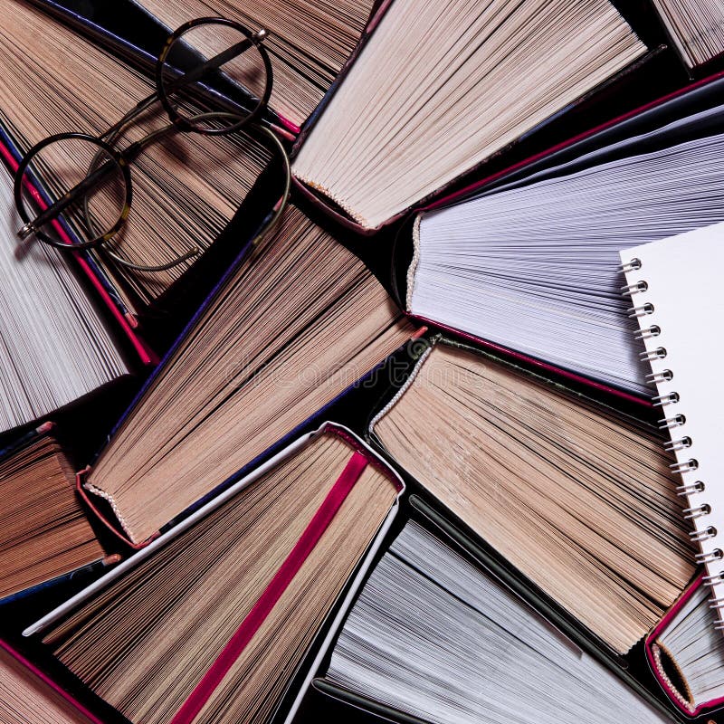 Library. Old Open Books Stand on a Bookshelf Ready To Read. Close-up ...
