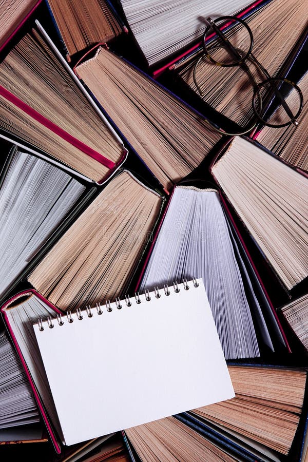Library. Old Open Books Stand on a Bookshelf Ready To Read. Close-up ...