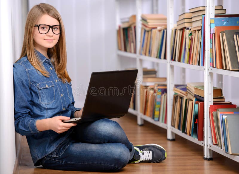 Smiling Student Using a Tablet Computer Stock Image - Image of miced ...