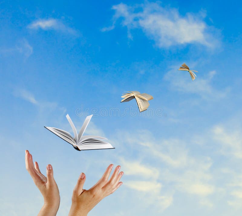 Libri Che Volano Dalle Mani Fotografia Stock - Immagine di formazione ...