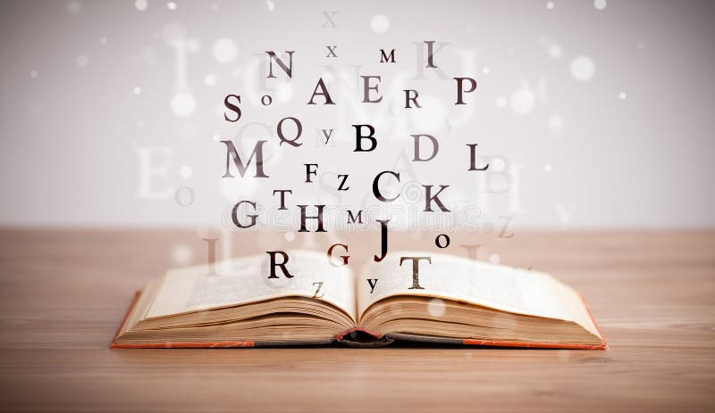 Libro Abierto Con Las Letras Del Vuelo Foto de archivo - Imagen de ...