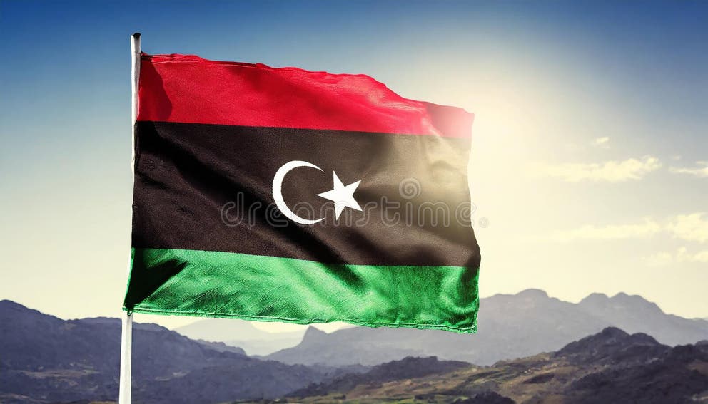 Libya Flag Waving on the Wind Stock Image - Image of symbol, clouds ...