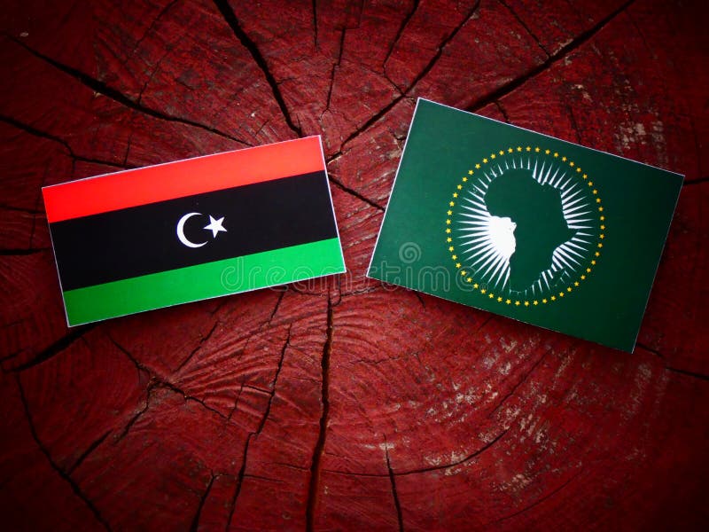 Libyan Flag with African Union Flag on a Tree Stump Stock Image - Image ...