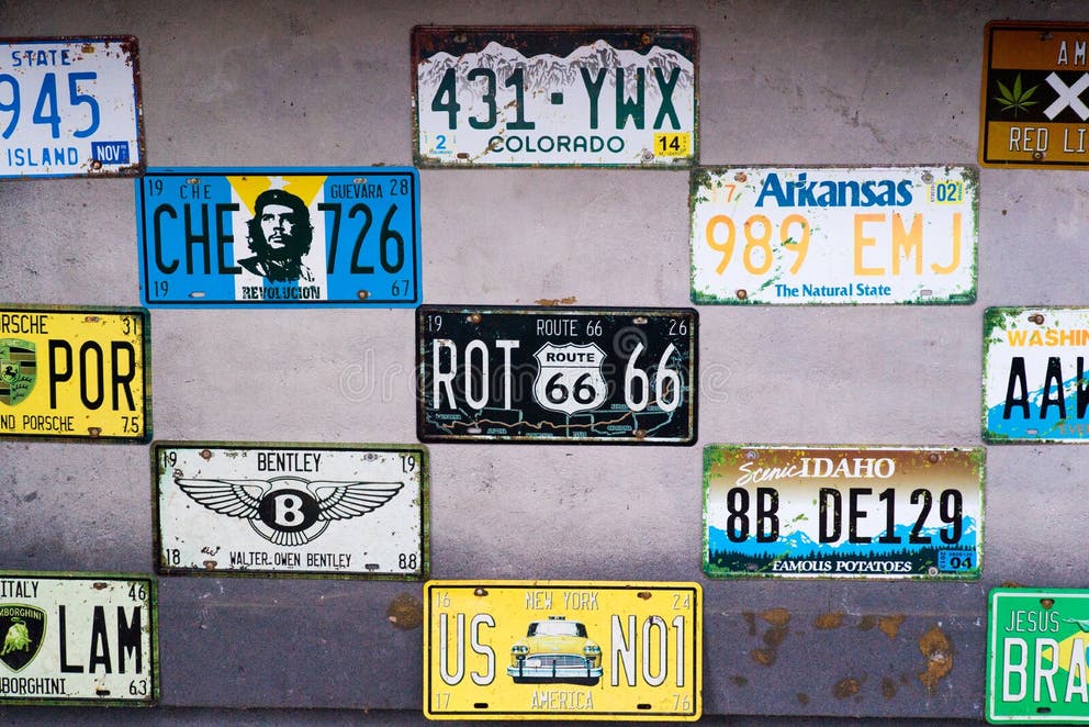 License plate on the wall editorial image. Image of time - 78780305