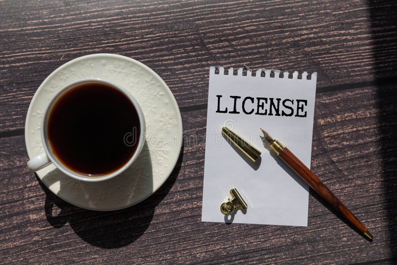 LICENSE Text Written on Sticky on Chart with Keyboard Stock Image ...