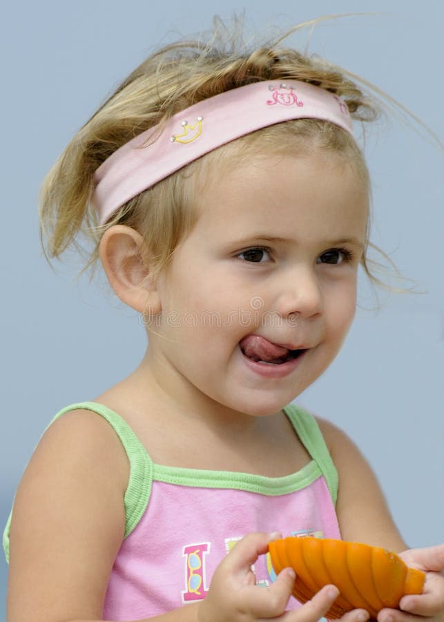 Licking lips stock image. Image of child, lovely, hair - 6965343