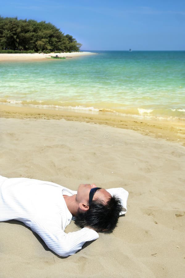 Lie down on tropical beach stock image. Image of relaxing - 9710697