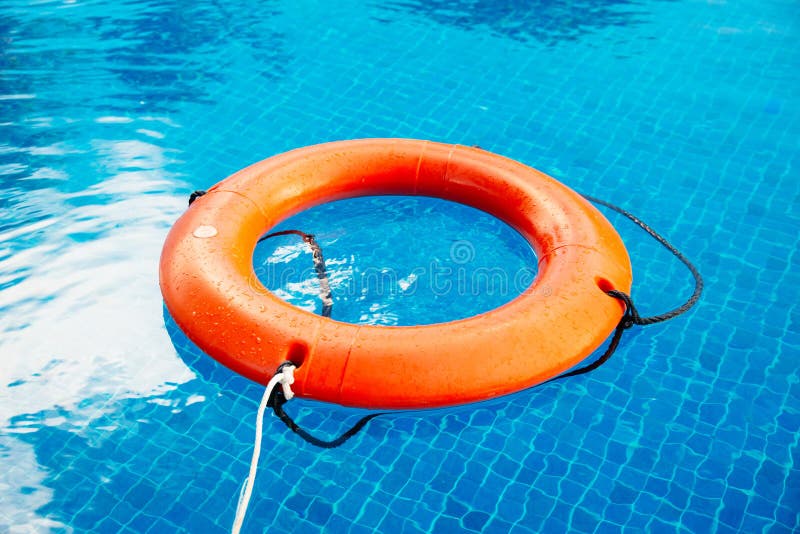 Life Buoy Afloat in a Pool in Mexico Stock Photo - Image of saver, blue ...