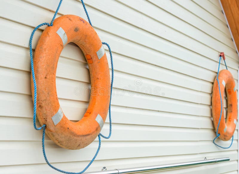 Life Buoy with Rope Hanging Around the Pool Stock Photo - Image of ring ...