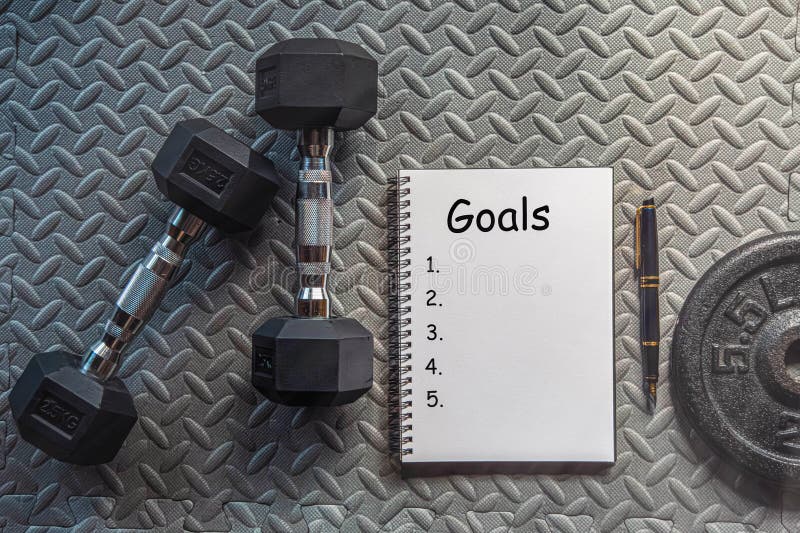 Life Goals are Written in a Notebook, Along with Exercise Equipment in ...