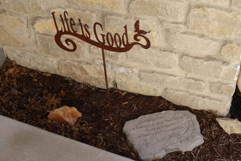 Life is Good Sign in Soil Against a Brick Wall. Stock Image - Image of ...