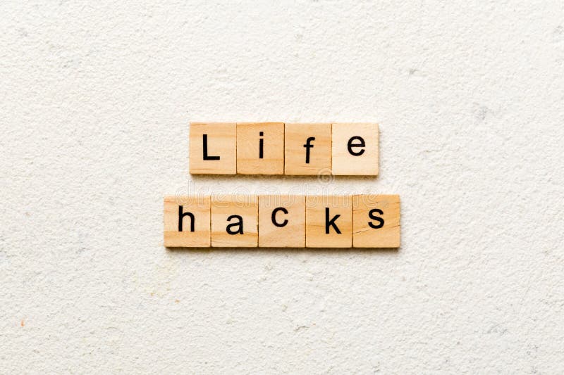 Life Hacks Word Written on Wood Block. Life Hacks Text on Table ...