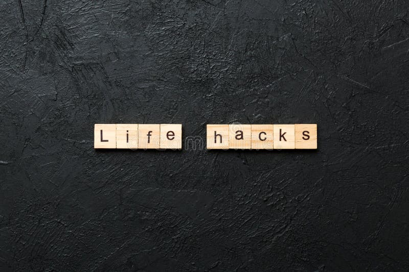 Life Hacks Word Written on Wood Block. Life Hacks Text on Table ...