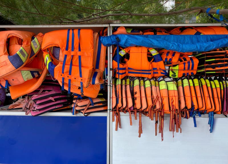 Life Jacket Stacked on the Rack Near the Beach Stock Photo - Image of ...
