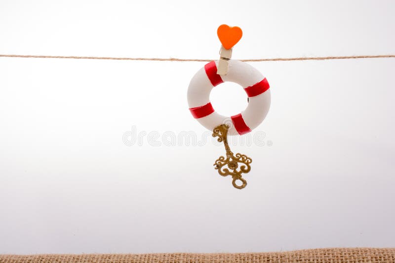 Life Preserver Attached To a String with Heart Stock Image - Image of ...
