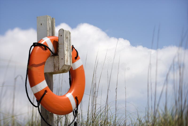 Life preserver on beach stock photo. Image of beach, life - 2051512