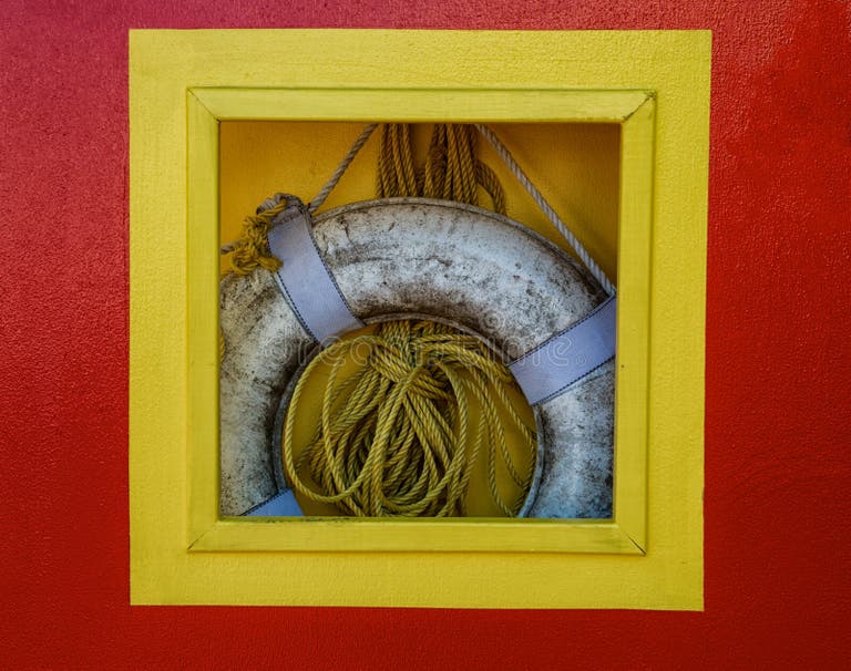 Life Preserver and Rope Hanging in Box on Dock Stock Image - Image of ...