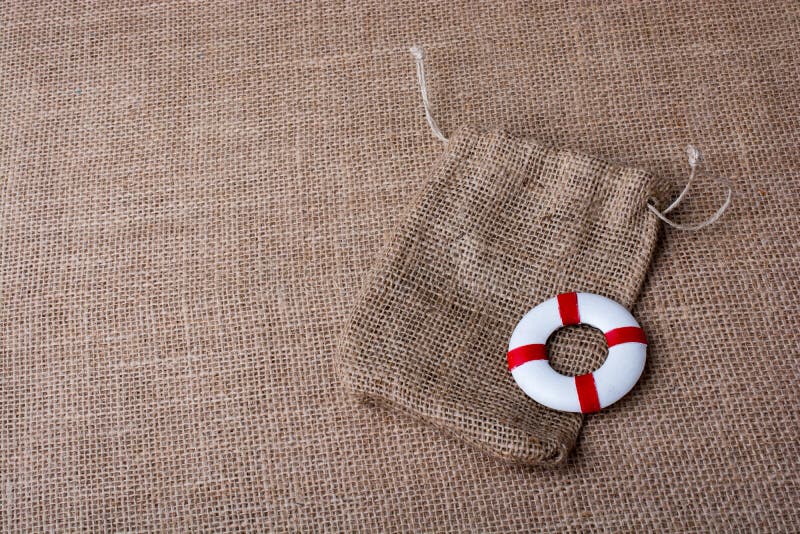 Life Preserver on a Sack on Canvas Stock Photo - Image of preserver ...