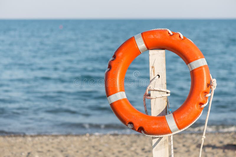 Life Preserver on Sandy Beach Stock Image - Image of beach, saver: 61373449