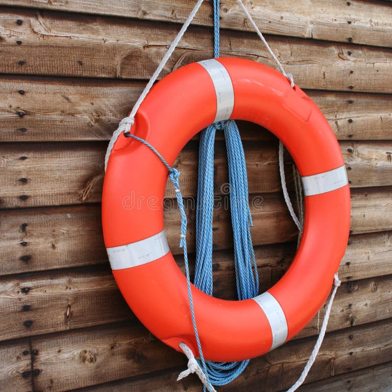 Life Ring with Red Rope on Blue Wood Background Stock Image - Image of ...